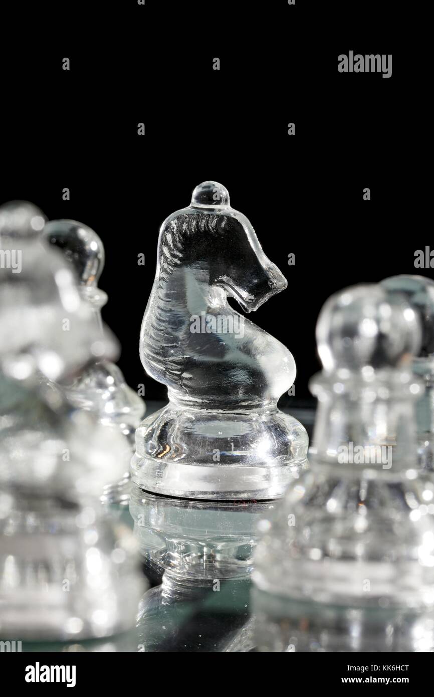 glass chess knight with pawn Stock Photo - Alamy