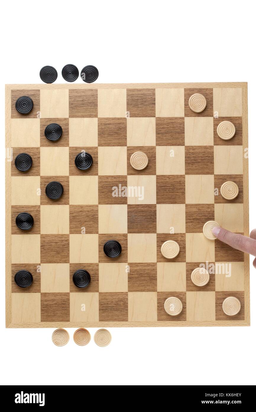 moving the white checker piece Stock Photo - Alamy