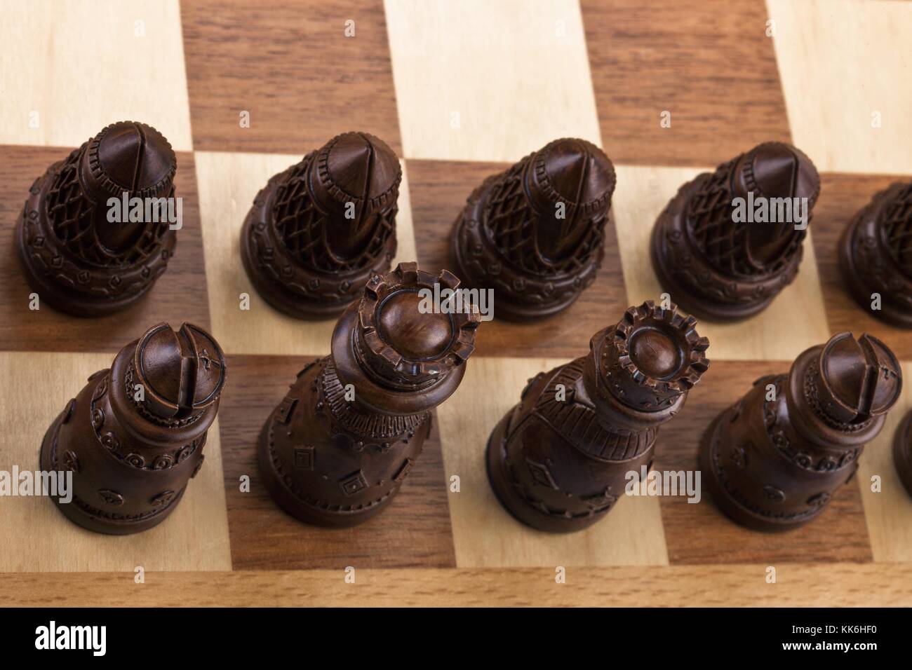 old brown chess pieces Stock Photo - Alamy