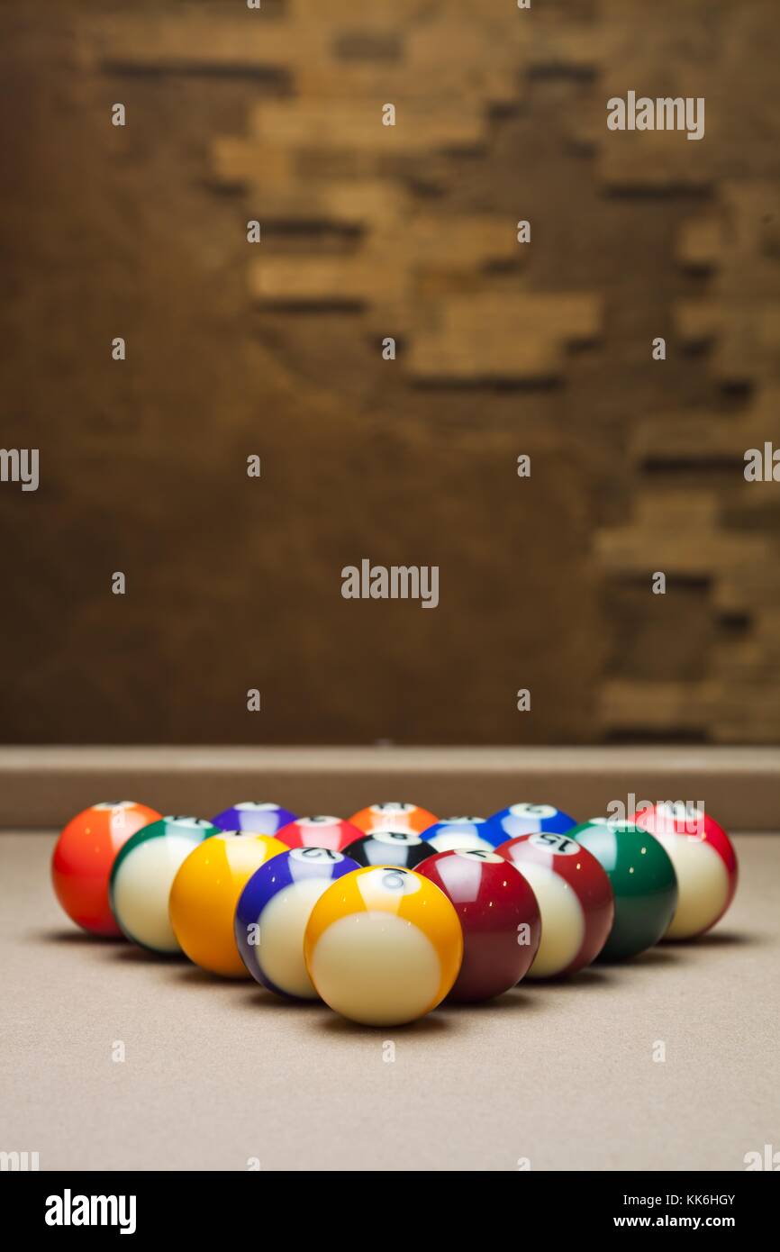 shiny pool balls arranged on table Stock Photo - Alamy