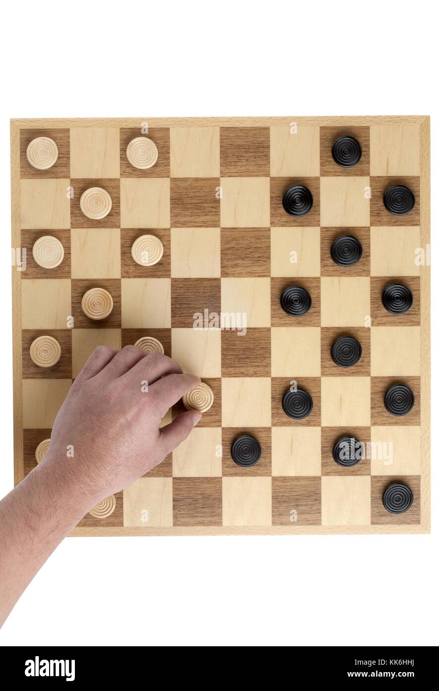top view image of hand holding checker piece Stock Photo - Alamy