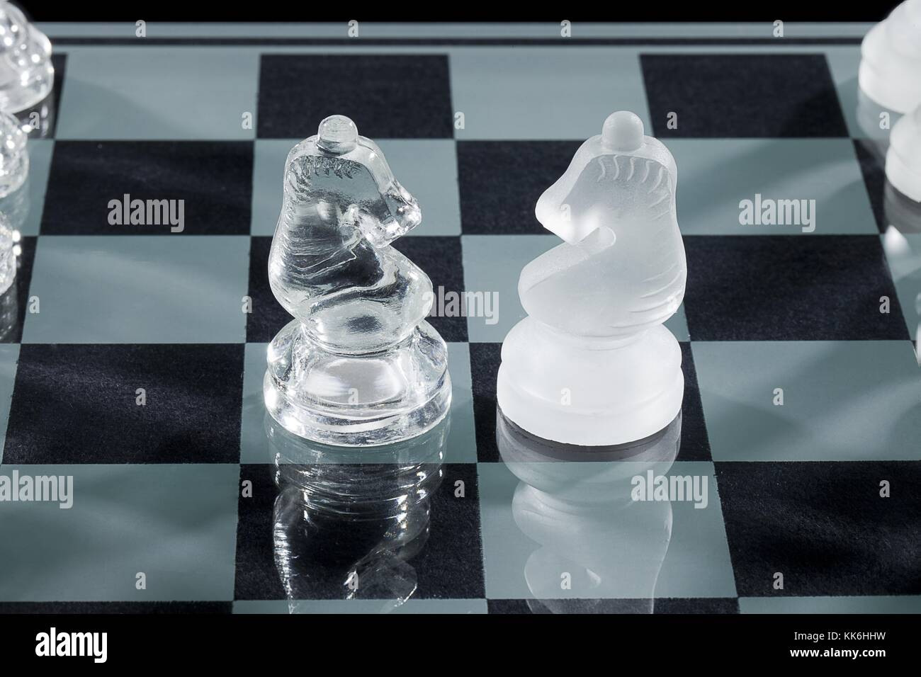 two chess knights facing each other Stock Photo - Alamy