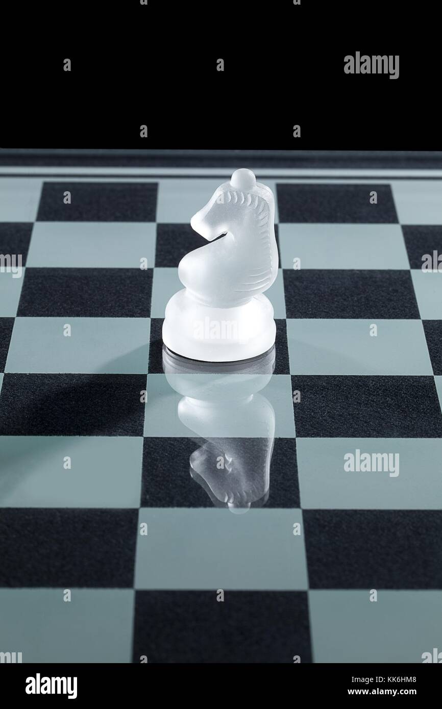 chess knight isolated on chess board Stock Photo - Alamy