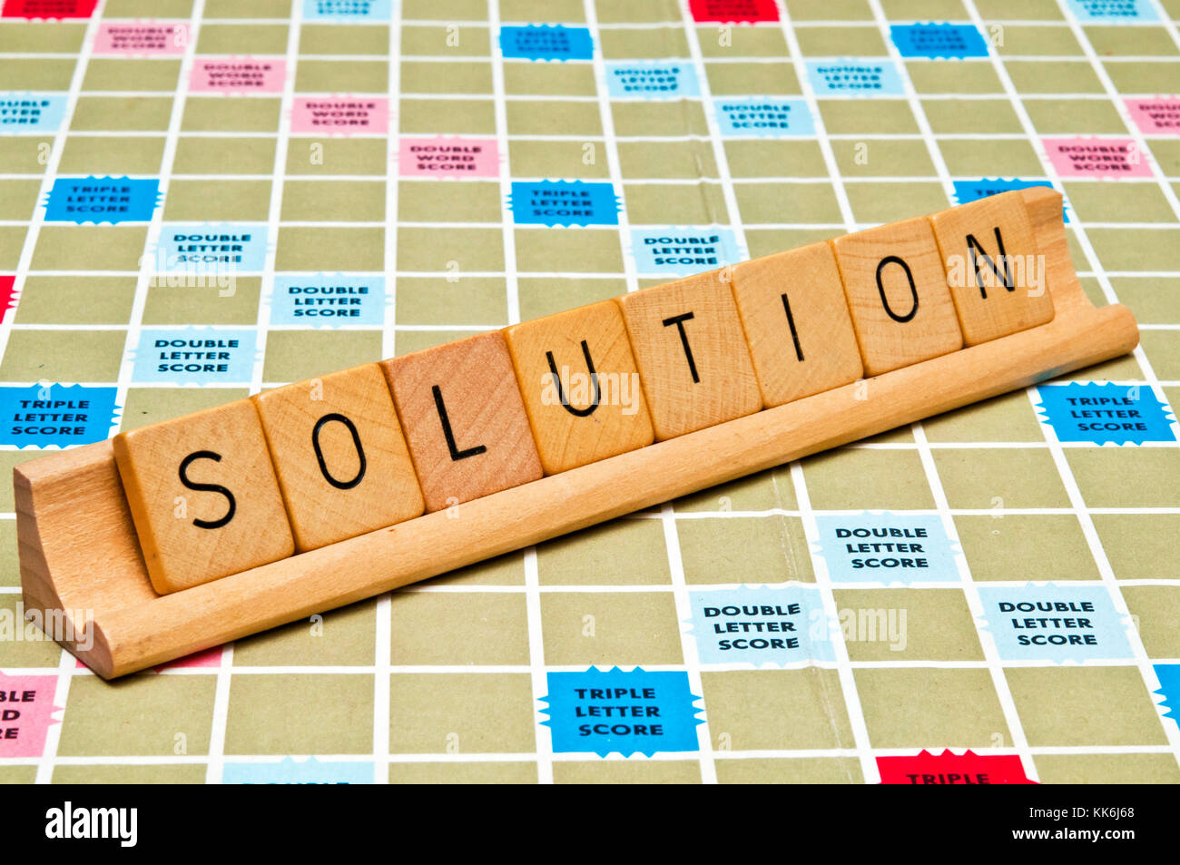 word SOLUTION composed with scrabble tiles Stock Photo - Alamy