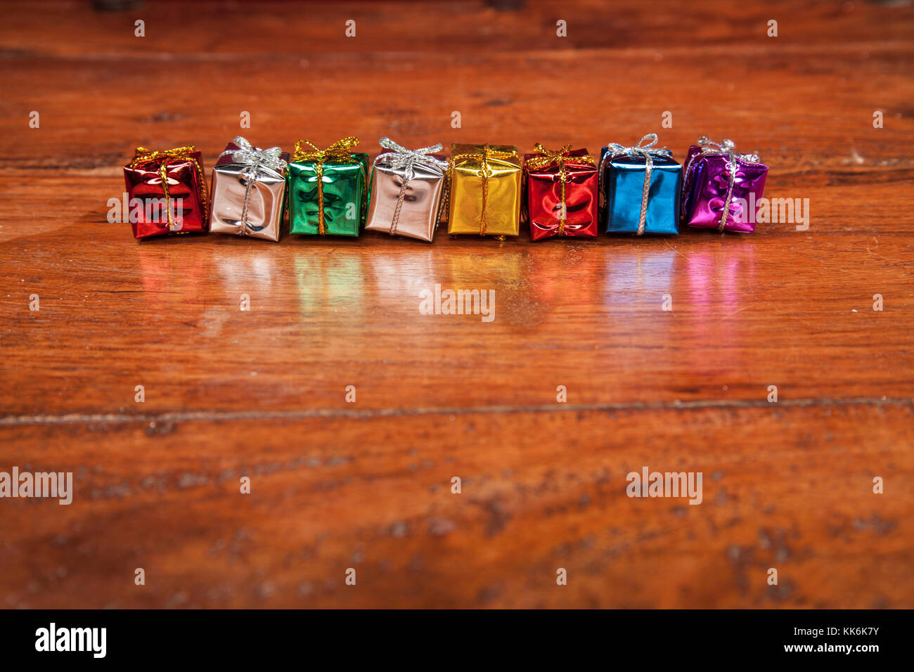 Rows of small gifts on the table Stock Photo - Alamy