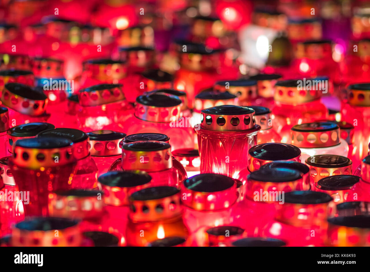 Burning candles on cemetery at night Stock Photo - Alamy