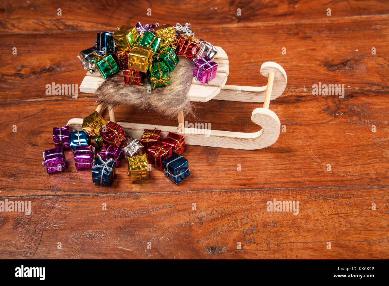 little lovely presents on a sleigh, top view Stock Photo - Alamy