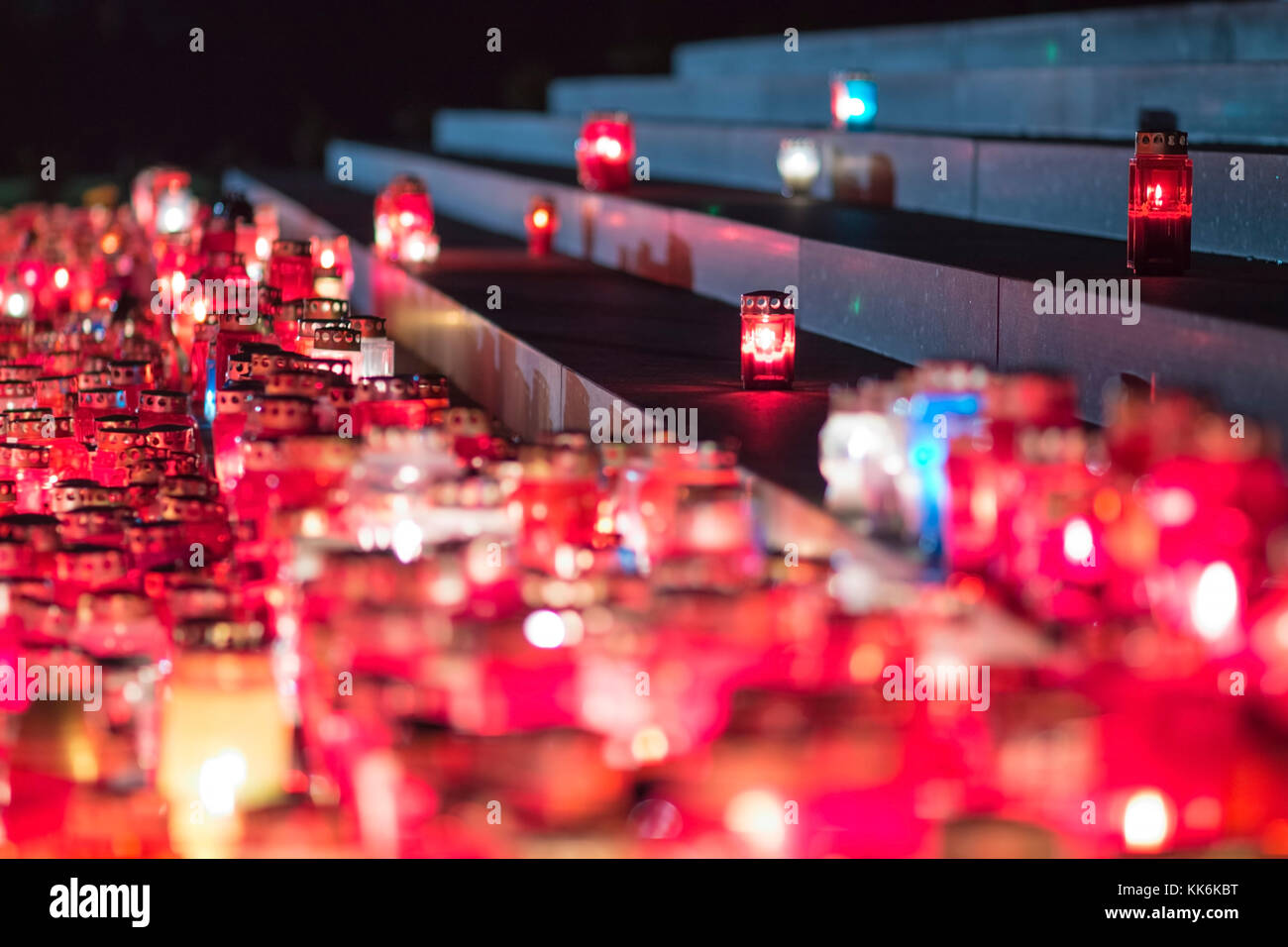Burning candles on cemetery at night Stock Photo - Alamy