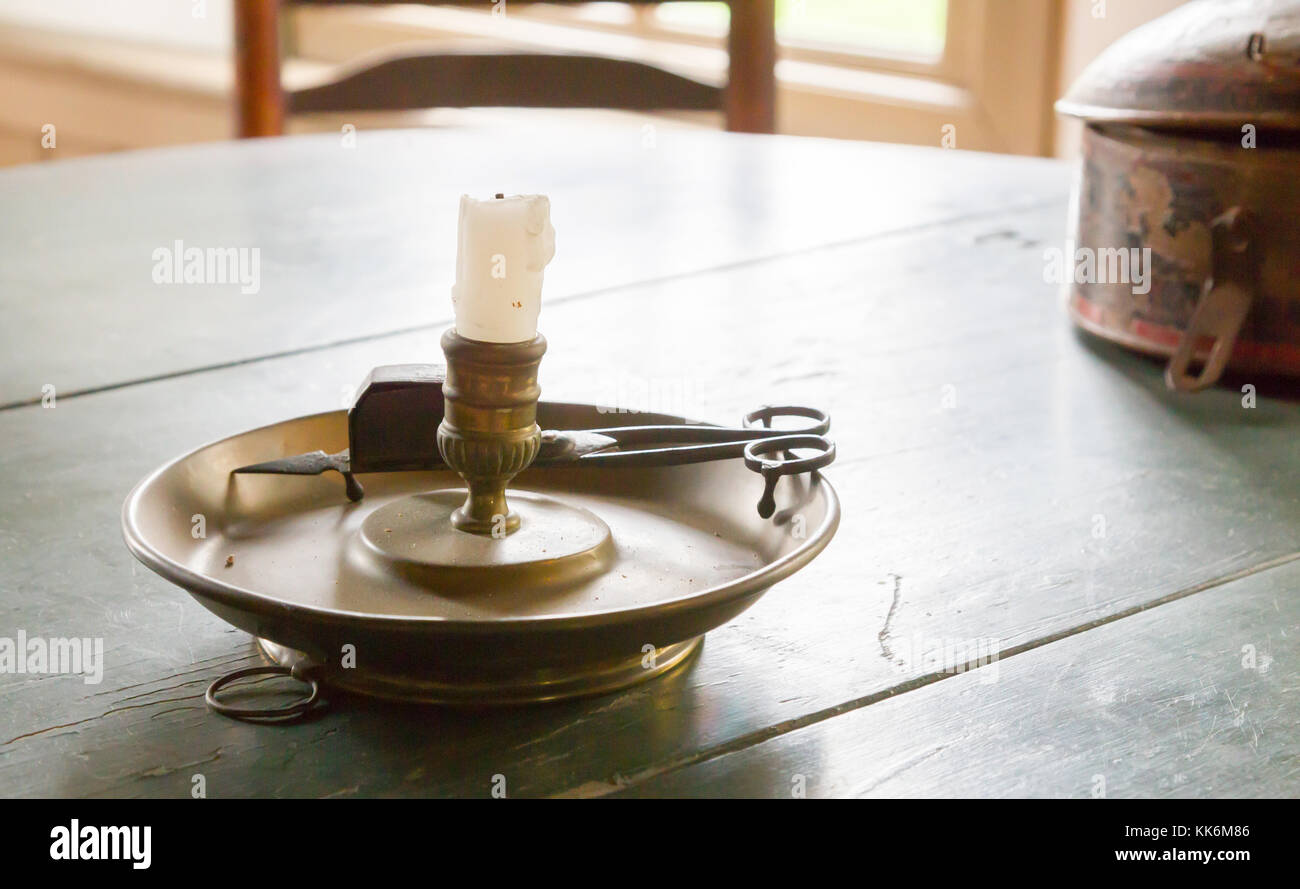 Candle in old fashioned retro holder - Daytime Stock Photo - Alamy