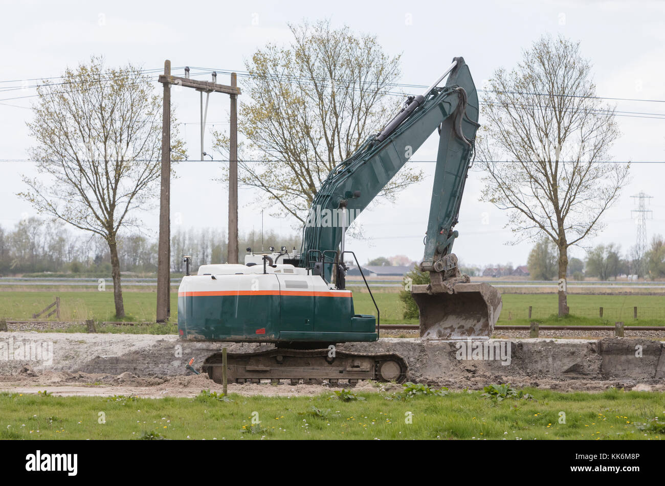 Excavator in construction site in the Netherlands Stock Photo - Alamy