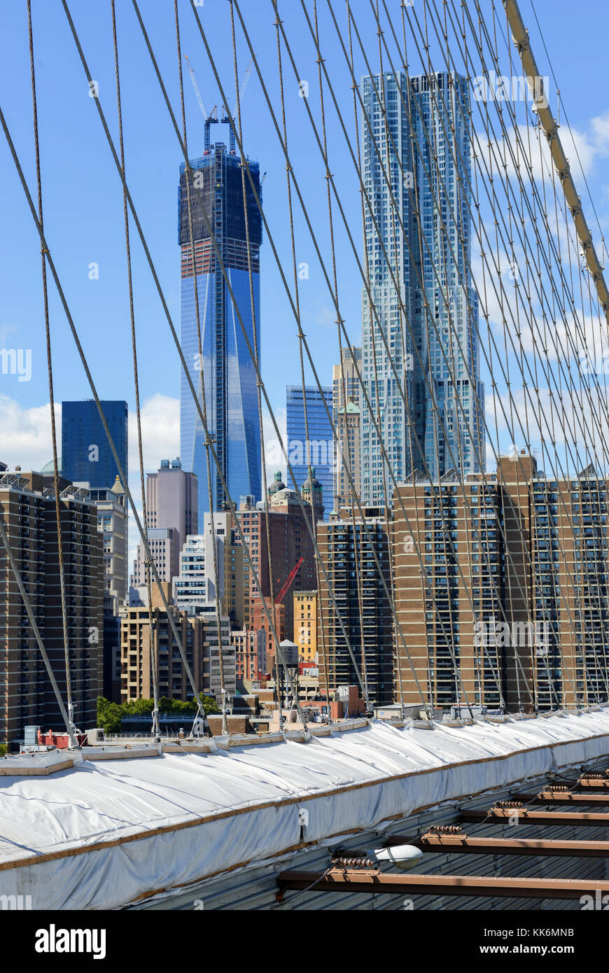 View of the New York City Skyline from the Brooklyn Bridge Stock Photo ...