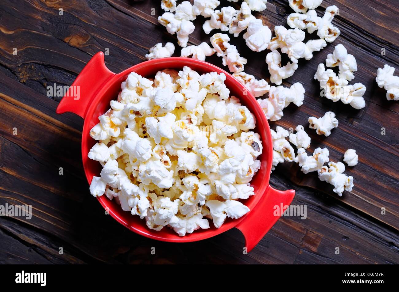 Freshly made popcorn on a wooden table Stock Photo - Alamy