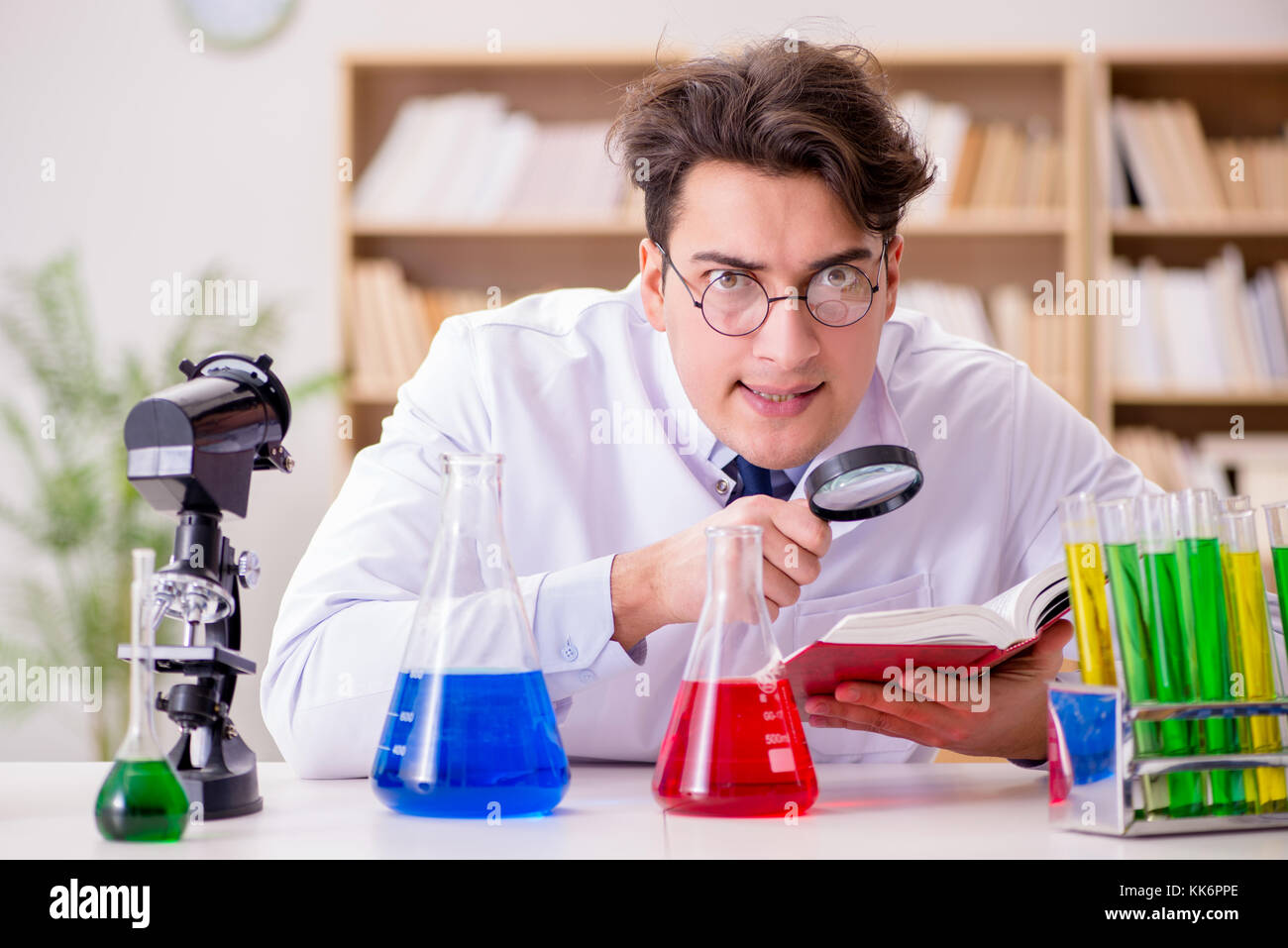 Mad crazy scientist doctor doing experiments in a laboratory Stock ...