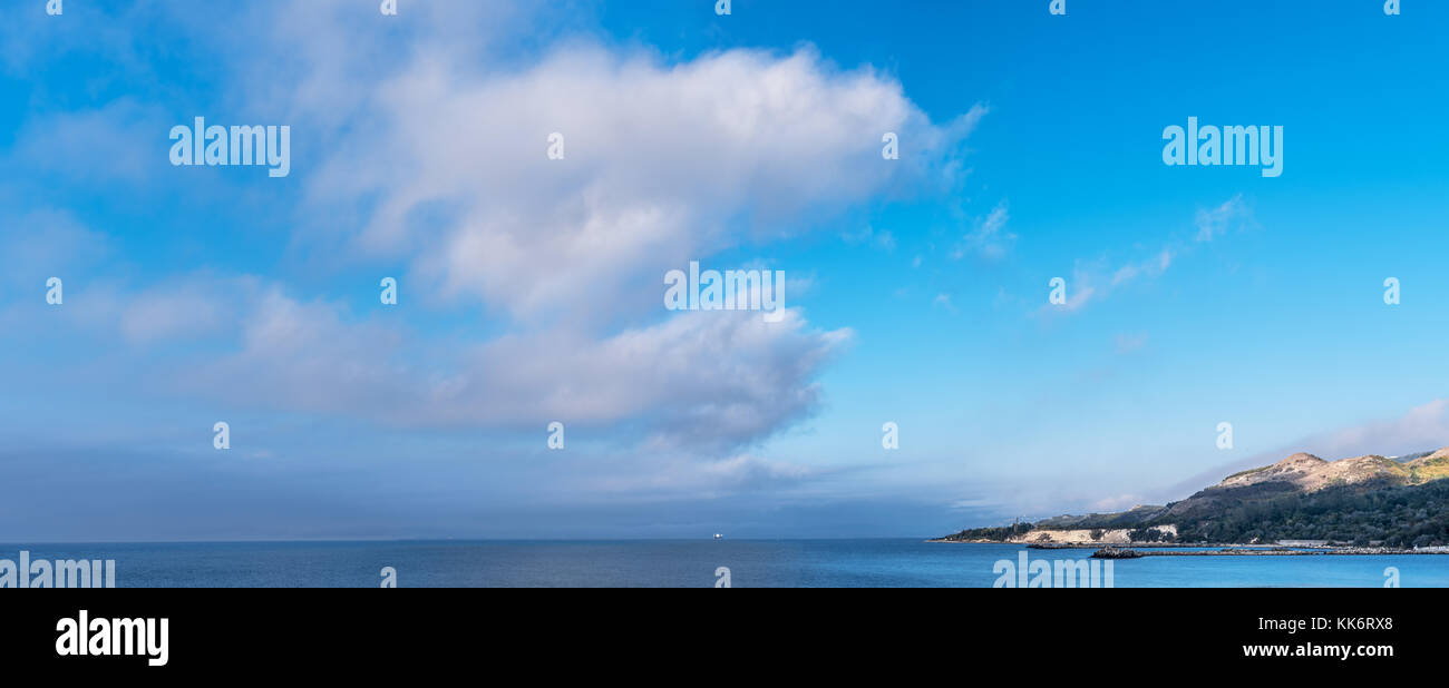 Calm sea and heavy clouds in the sky. Nature background Stock Photo - Alamy