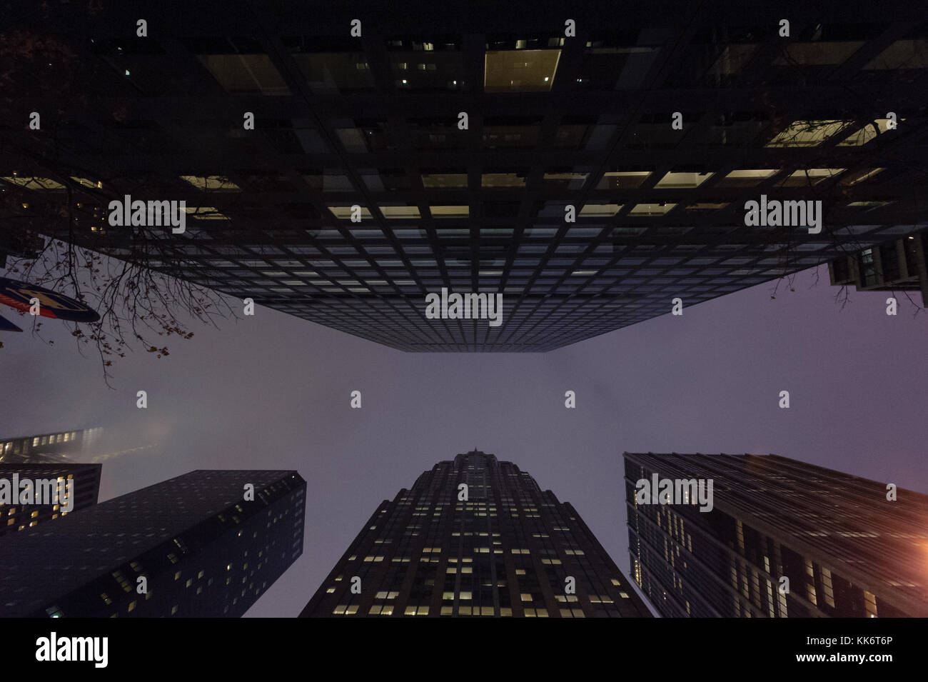 new york skycrapers bottom view by night Stock Photo - Alamy