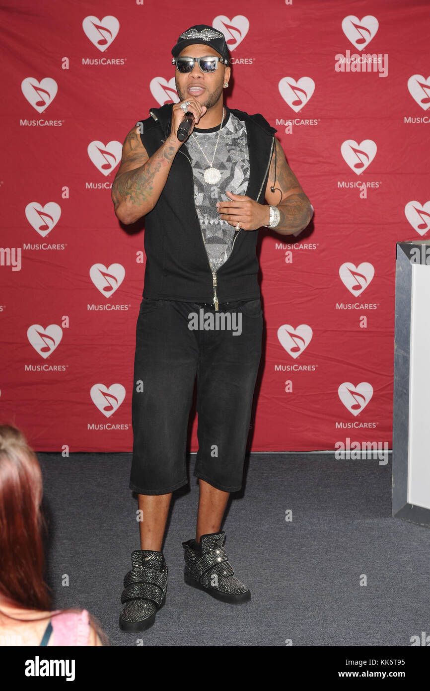 FORT LAUDERDALE, FL - NOVEMBER 22: Richie Supa and Flo Rida attend ...