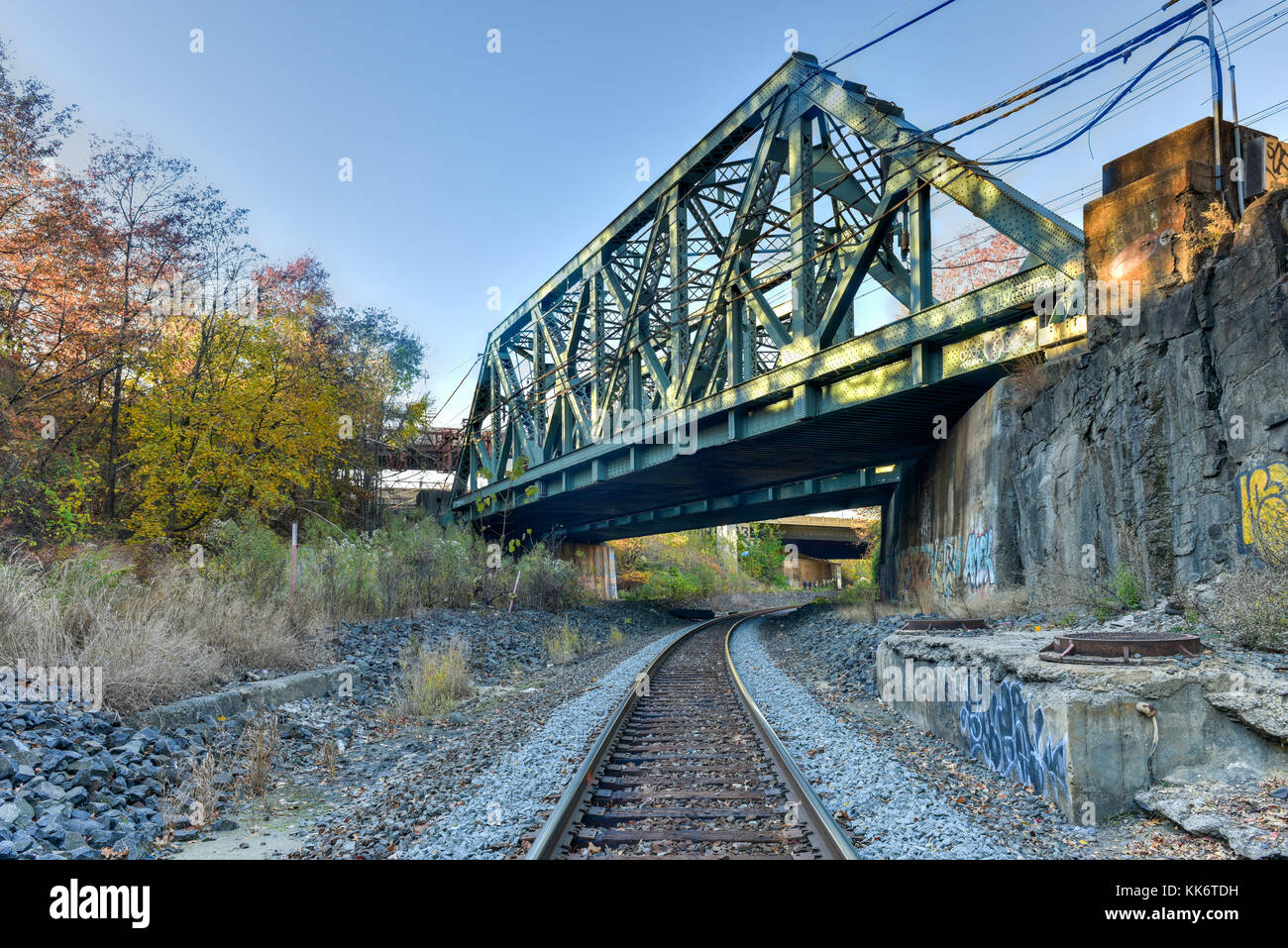 Train tracks going through the Bergen Arches of Jersey City, New Jersey ...