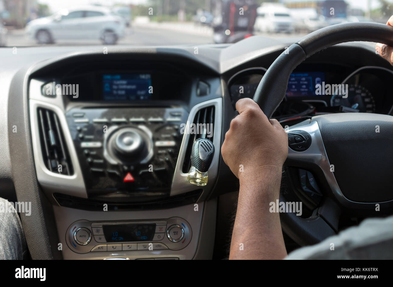 Closeup Hand driving a car Stock Photo - Alamy