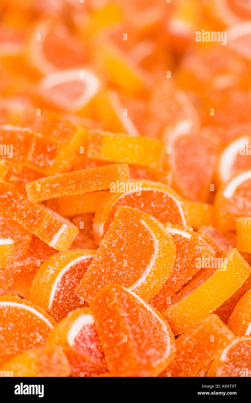 Orange sugar candy pile on street market, selective focus Stock Photo ...