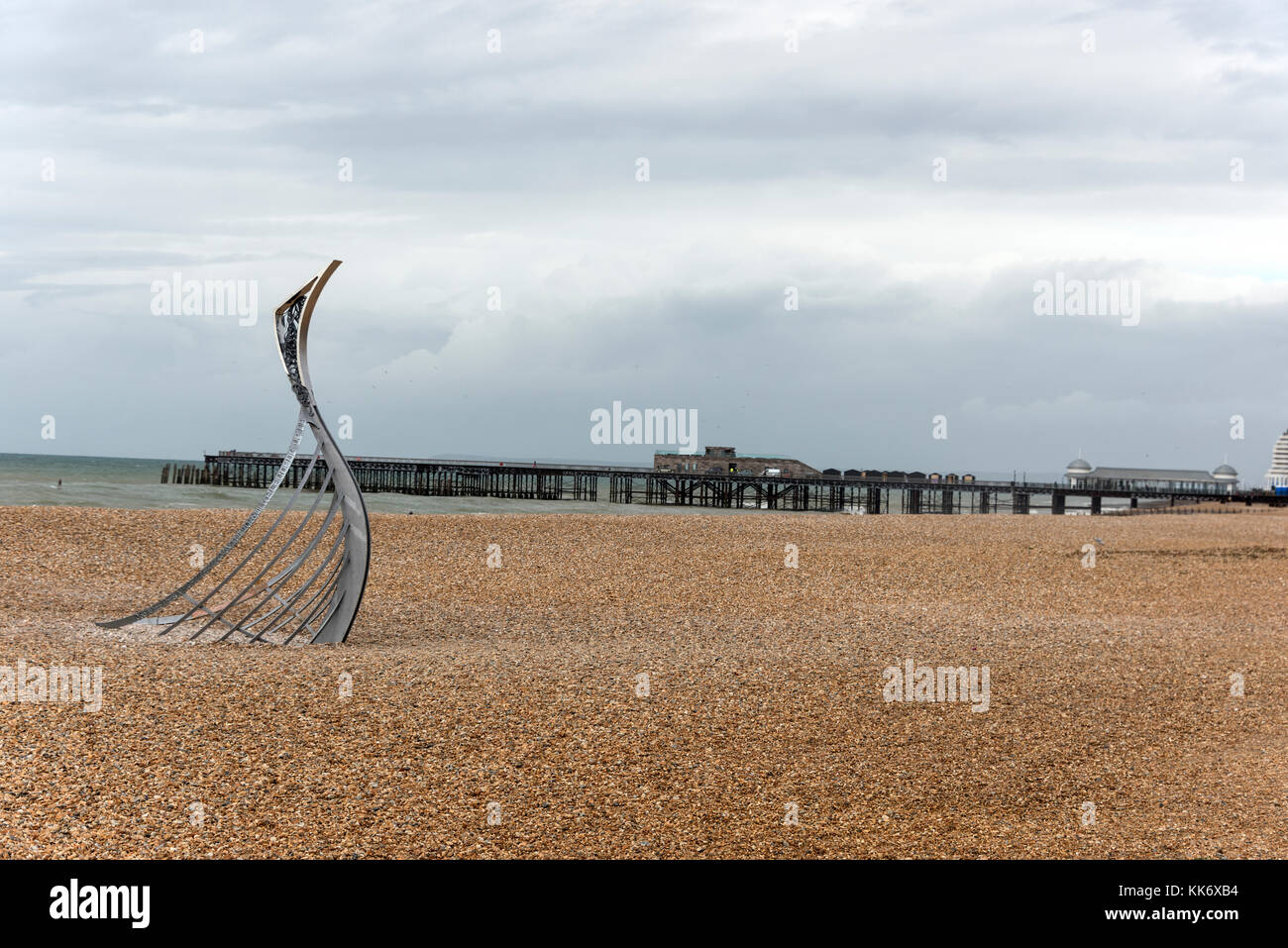 A tall metal sculptured structure of a Norman long ship commemorating ...