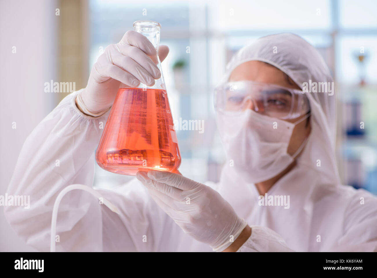 Chemist working in the laboratory with hazardous chemicals Stock Photo ...