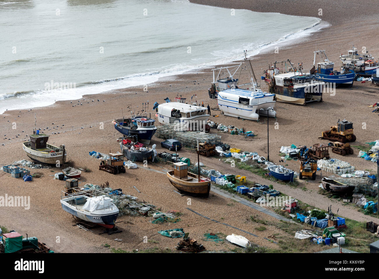 Moored fishing boats on the Slade shingle beach in Hastings Old Town ...