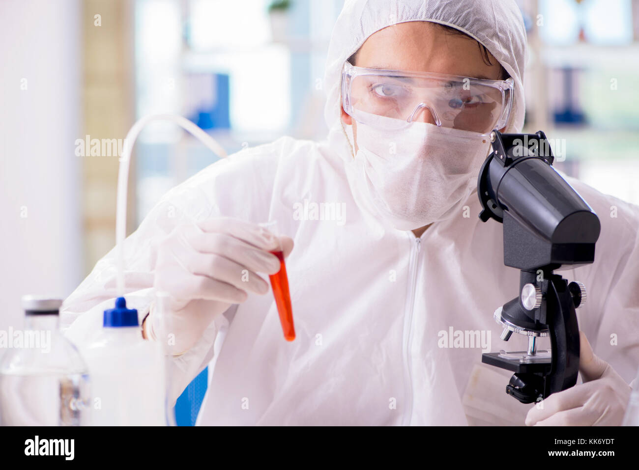 Chemist working in the laboratory with hazardous chemicals Stock Photo ...