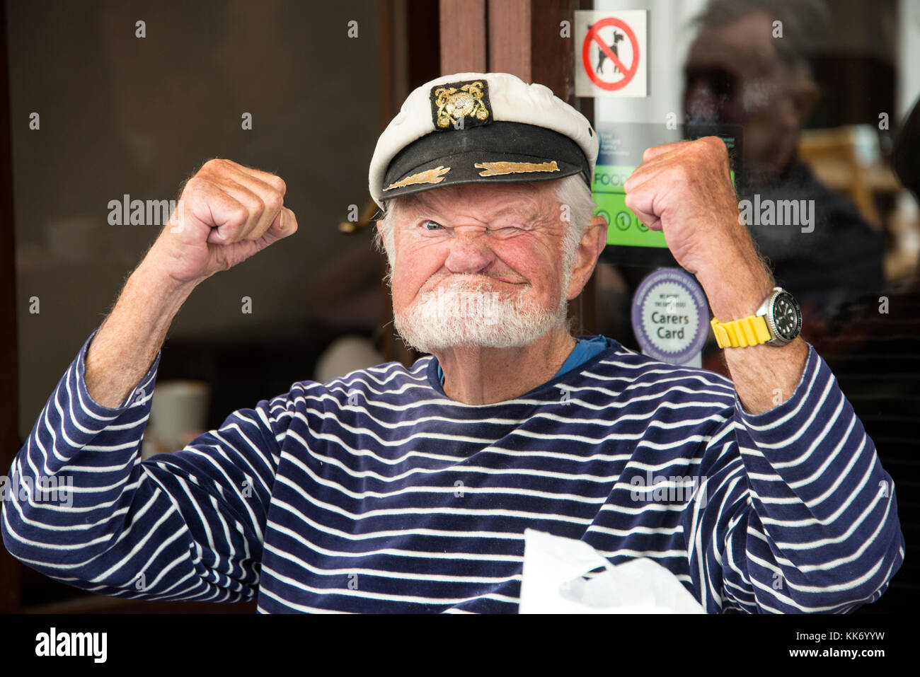 A local resident giving passing visitor's the cartoon character ...