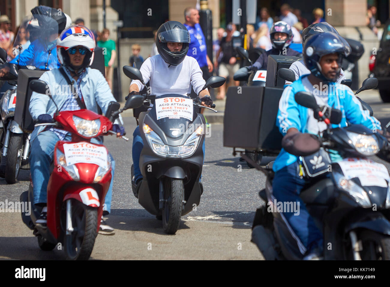 Moped riders, including couriers and delivery drivers, protest in ...