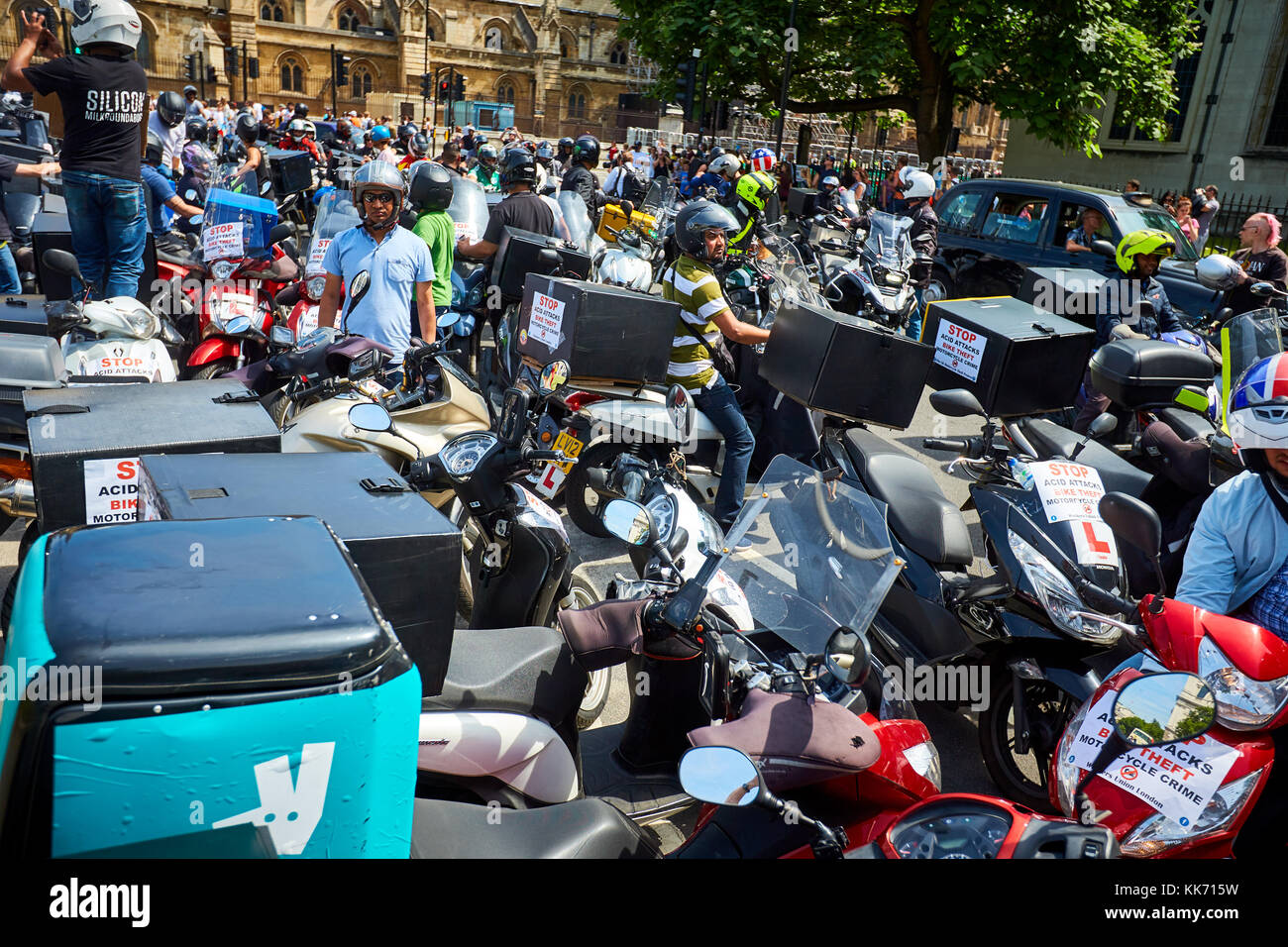 Moped riders, including couriers and delivery drivers, protest in ...