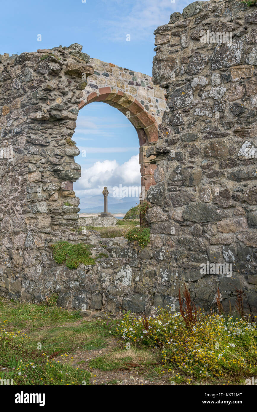 St Dwynwen's celtic stone cross And Church on Ynys Llanddwyn on ...