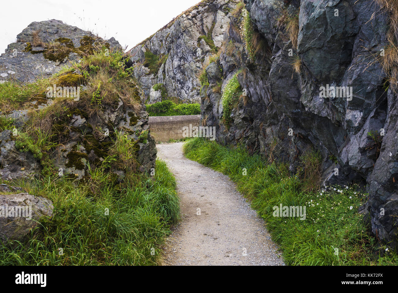 Stone rocks mountain hiking path at Irish seacoast. Bray, Greystone ...