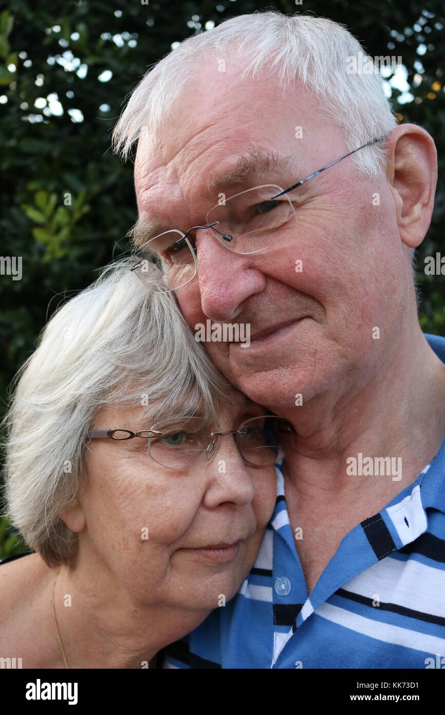 Portrait of a senior couple in a loving embrace Stock Photo - Alamy