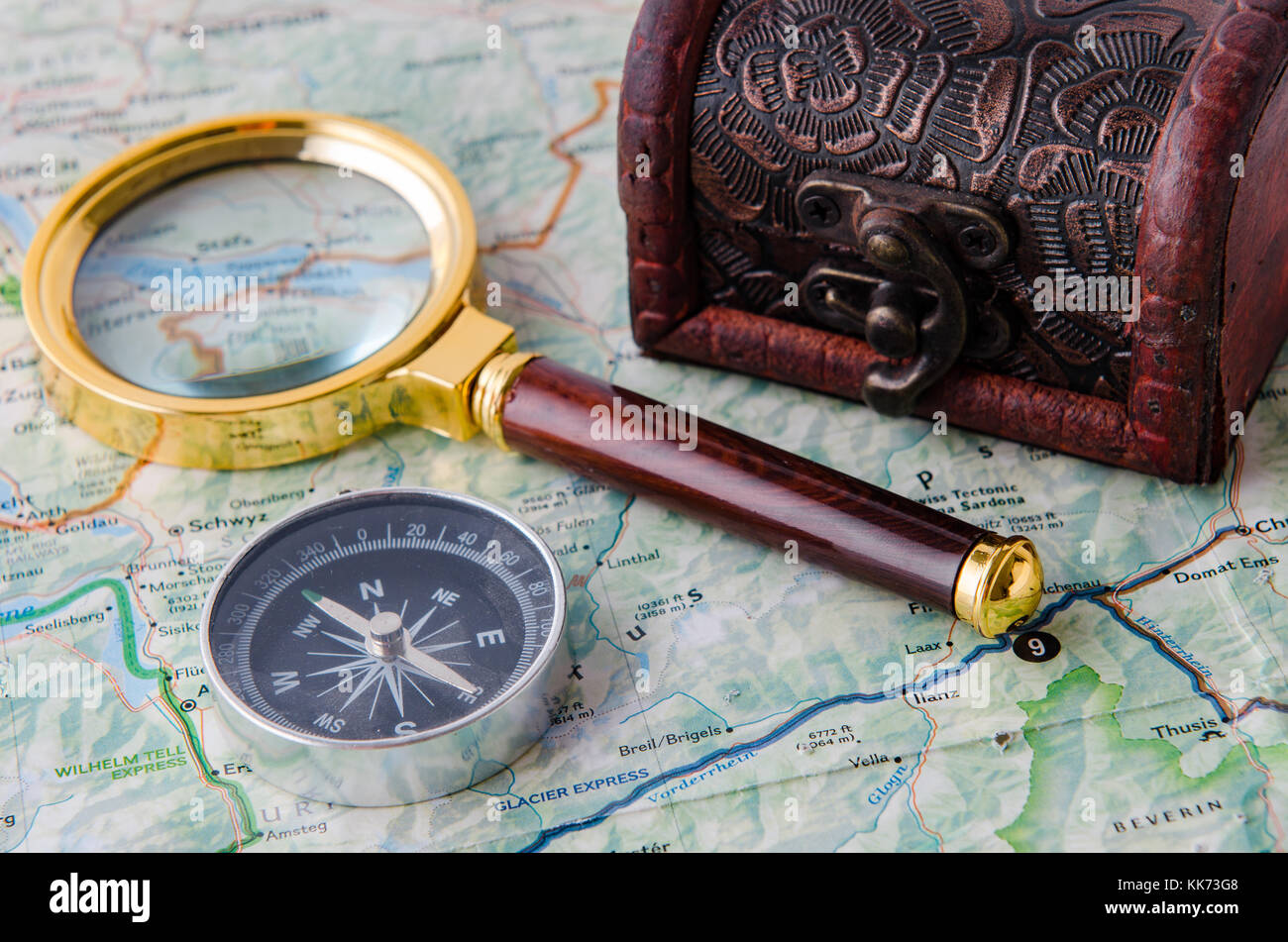 Travel concept with compass and map Stock Photo - Alamy