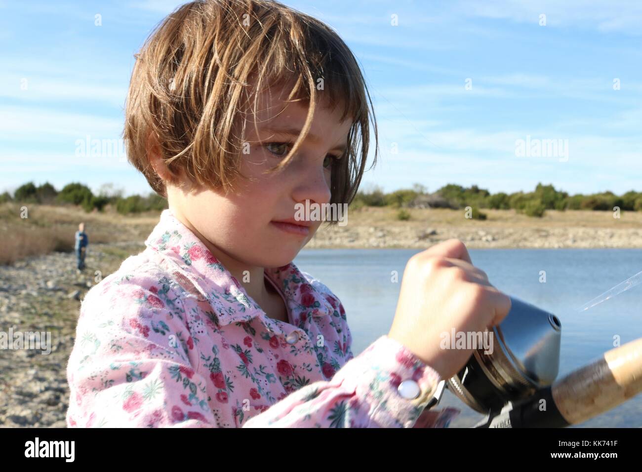 Reeling in a fish hi-res stock photography and images - Alamy