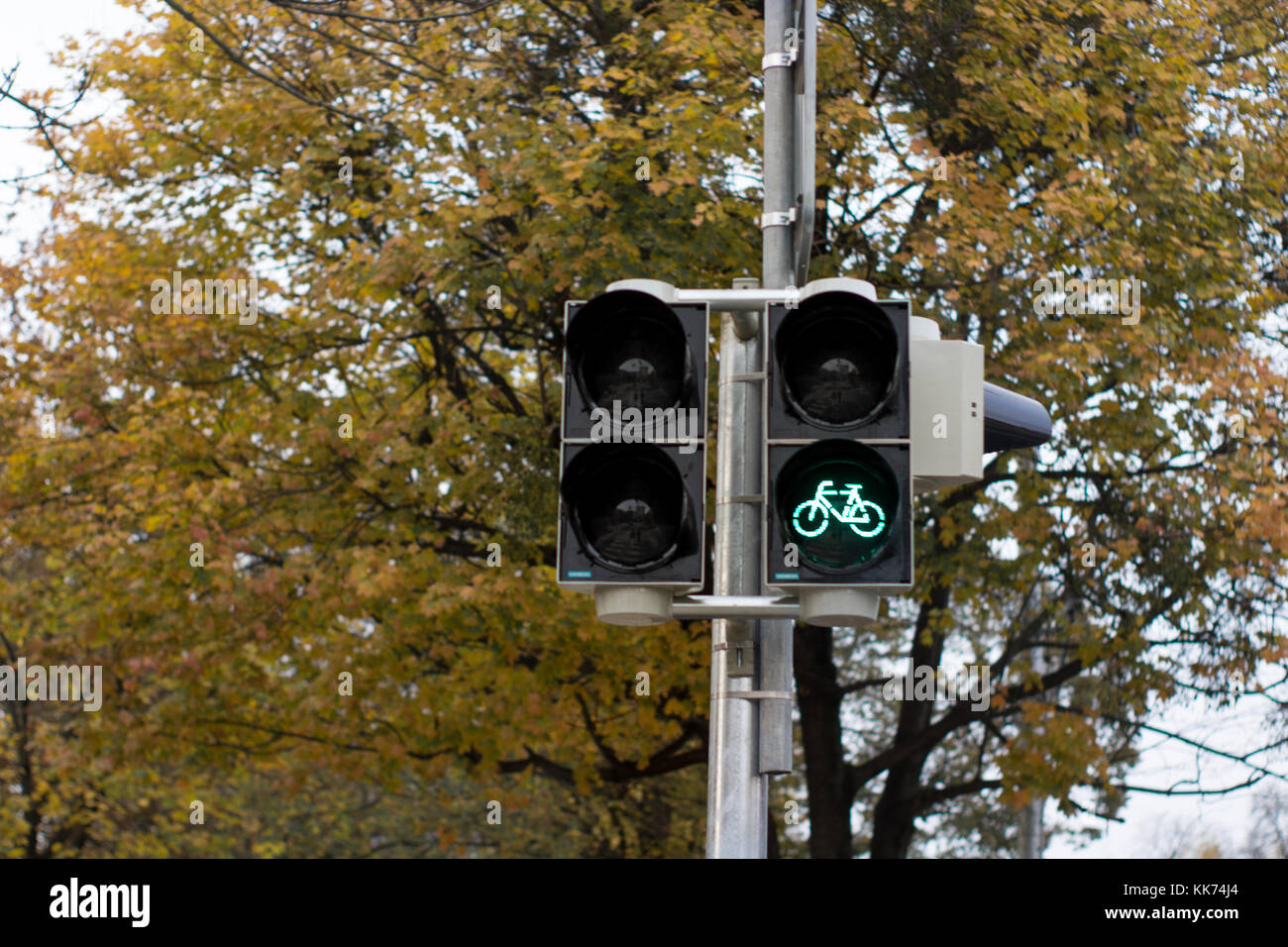 traffic lights with bike sign green light intersection Stock Photo - Alamy