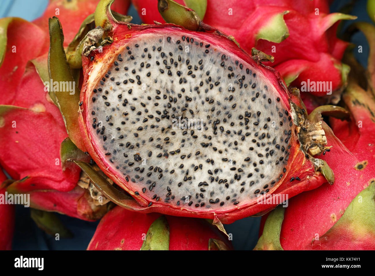 Close up several red ripe pitaya or white pitahaya dragon fruit with ...