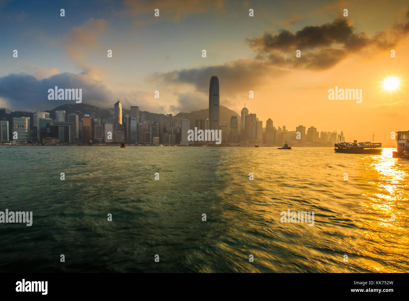 Hong Kong Victoria Harbour at sunset Stock Photo - Alamy
