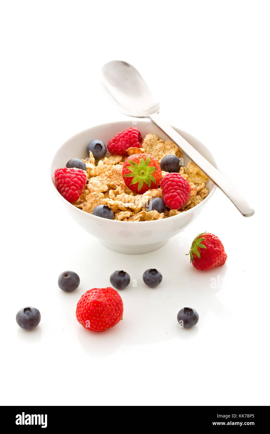 photo of delicious breafast isolated on white made of corn flakes with ...