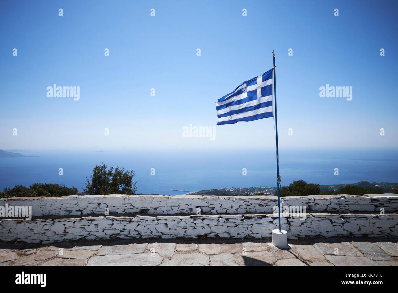 The Greek flag flying in Ikaria, Greece Stock Photo - Alamy