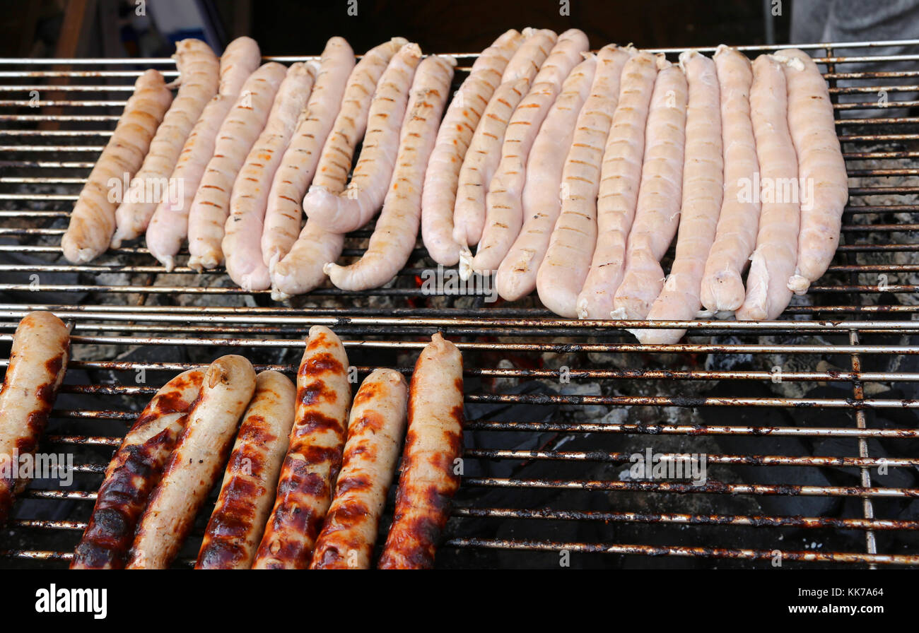 So many tasty wurstels and smoked sausages cooked in the food stall on ...
