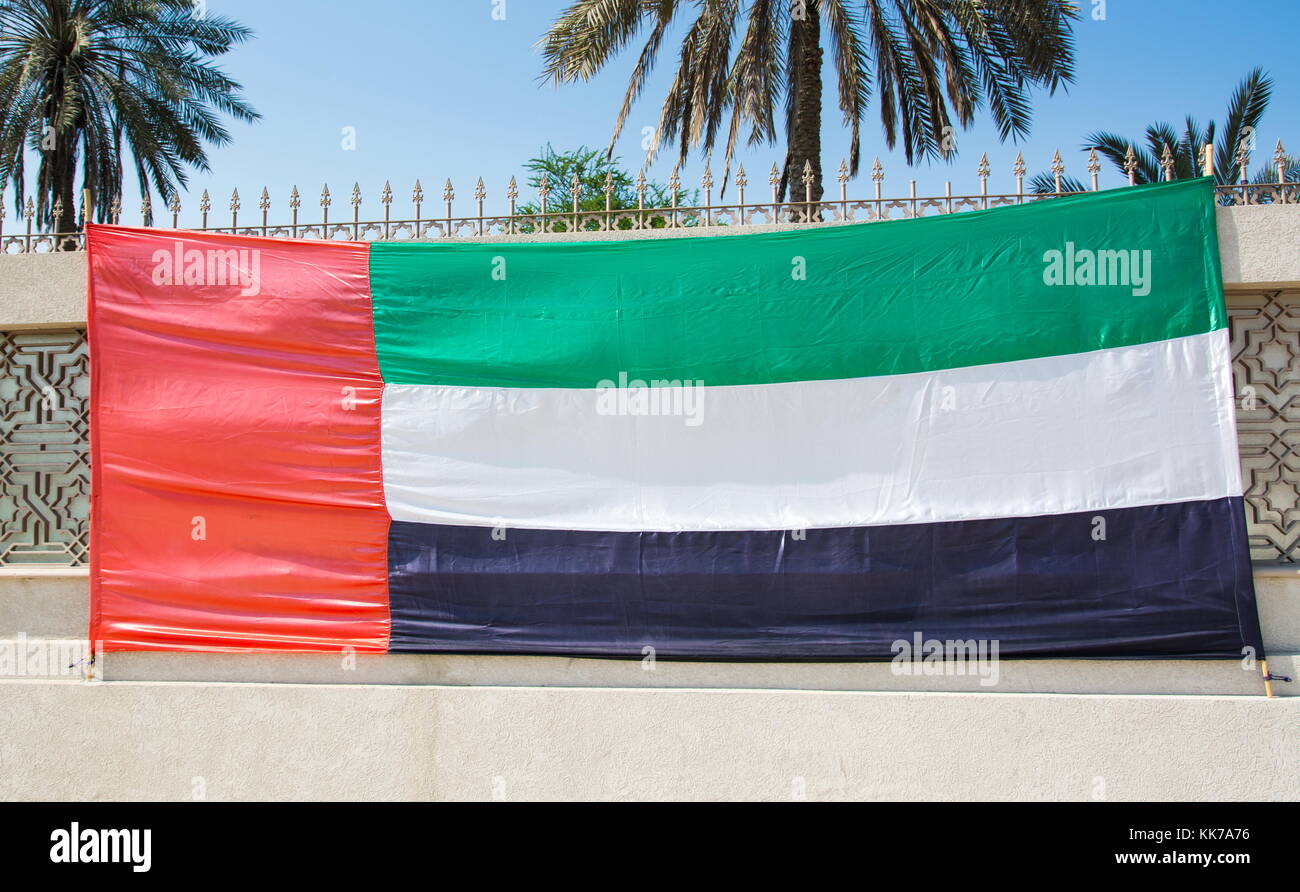 United Arab Emirates flag streatched on the stone wall Stock Photo - Alamy