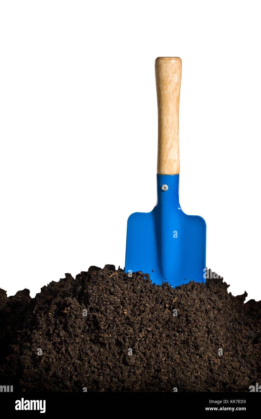 Close-up of organic soil and spade isolated on white background Stock ...