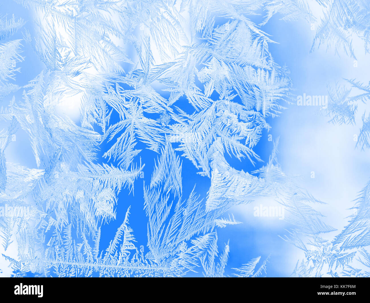 Blue toned fancy pattern of the hoarfrost on the window glass Stock ...