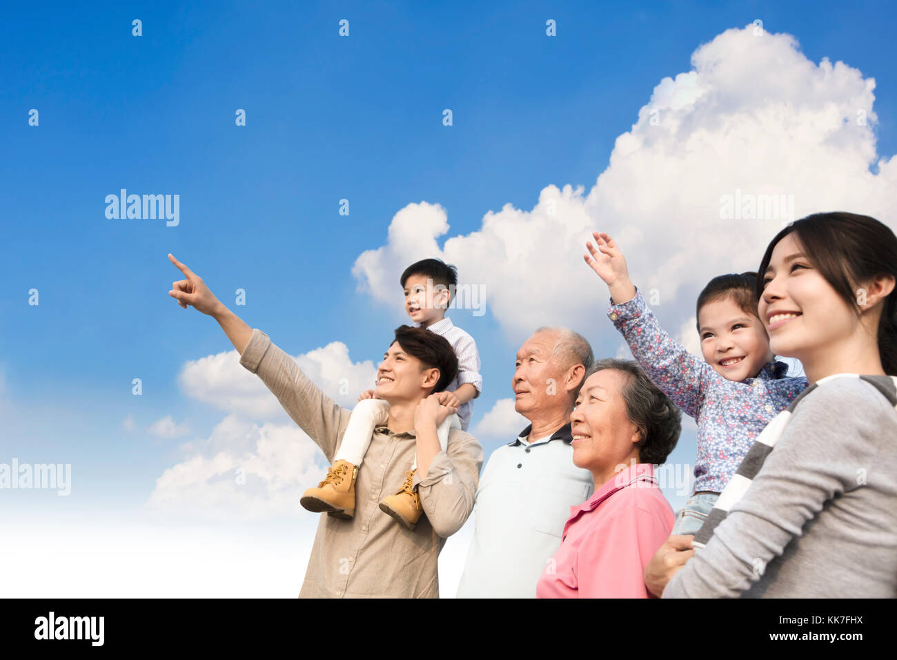 three generations family having fun together outdoors Stock Photo - Alamy