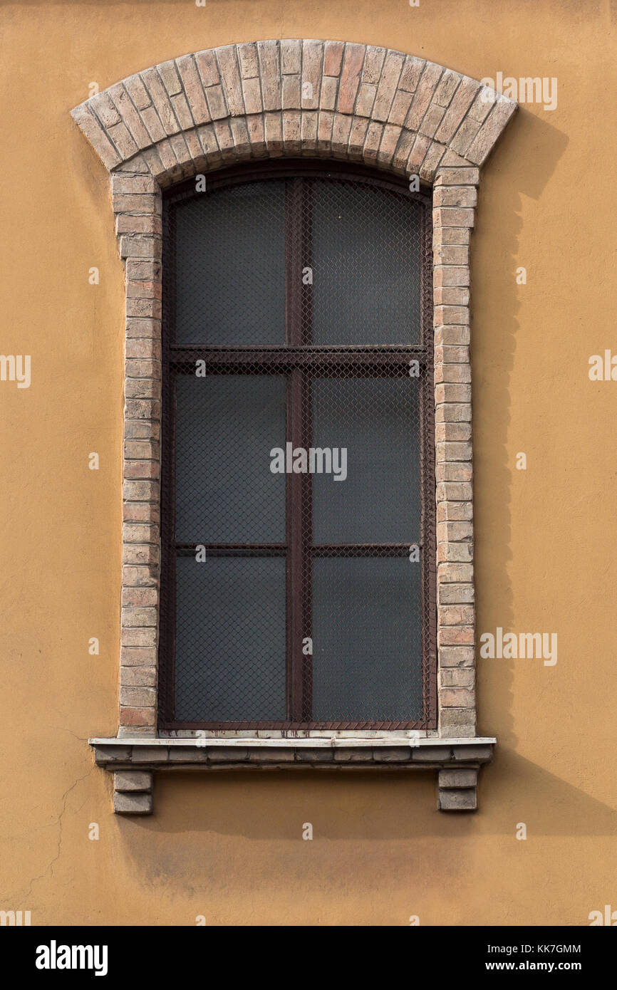 Retro looking window with brick frame Stock Photo - Alamy
