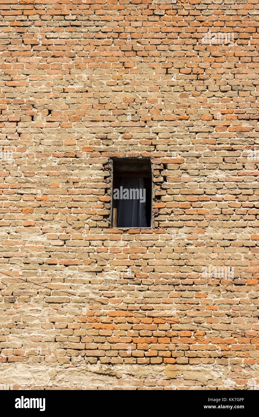 Empty window on an old brick wall Stock Photo - Alamy