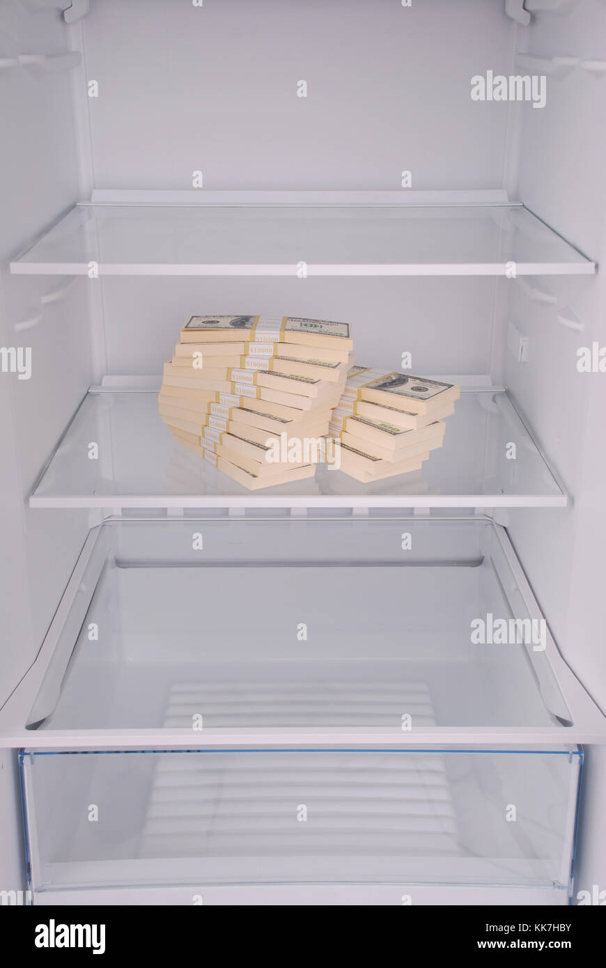 Dollars inside in empty clean refrigerator with opened door Stock Photo ...