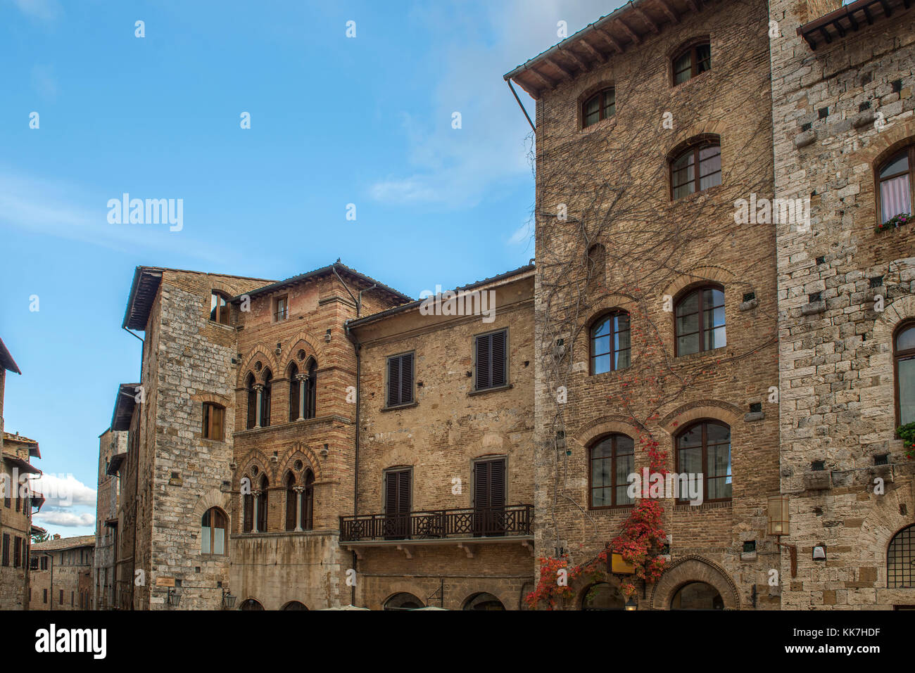 old brick buildings with flowers Stock Photo - Alamy