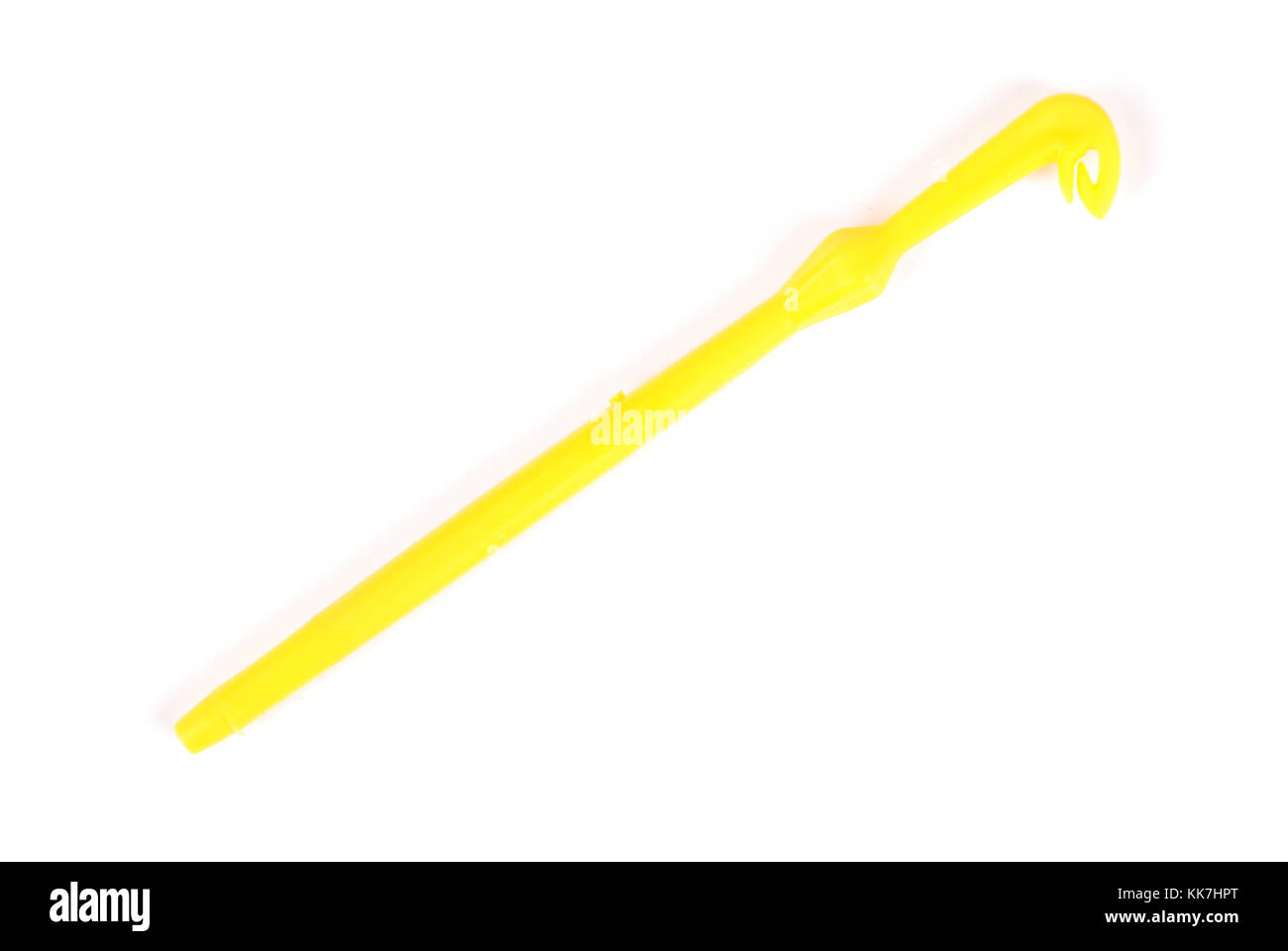 One yellow loop tier isolated on white background Stock Photo - Alamy